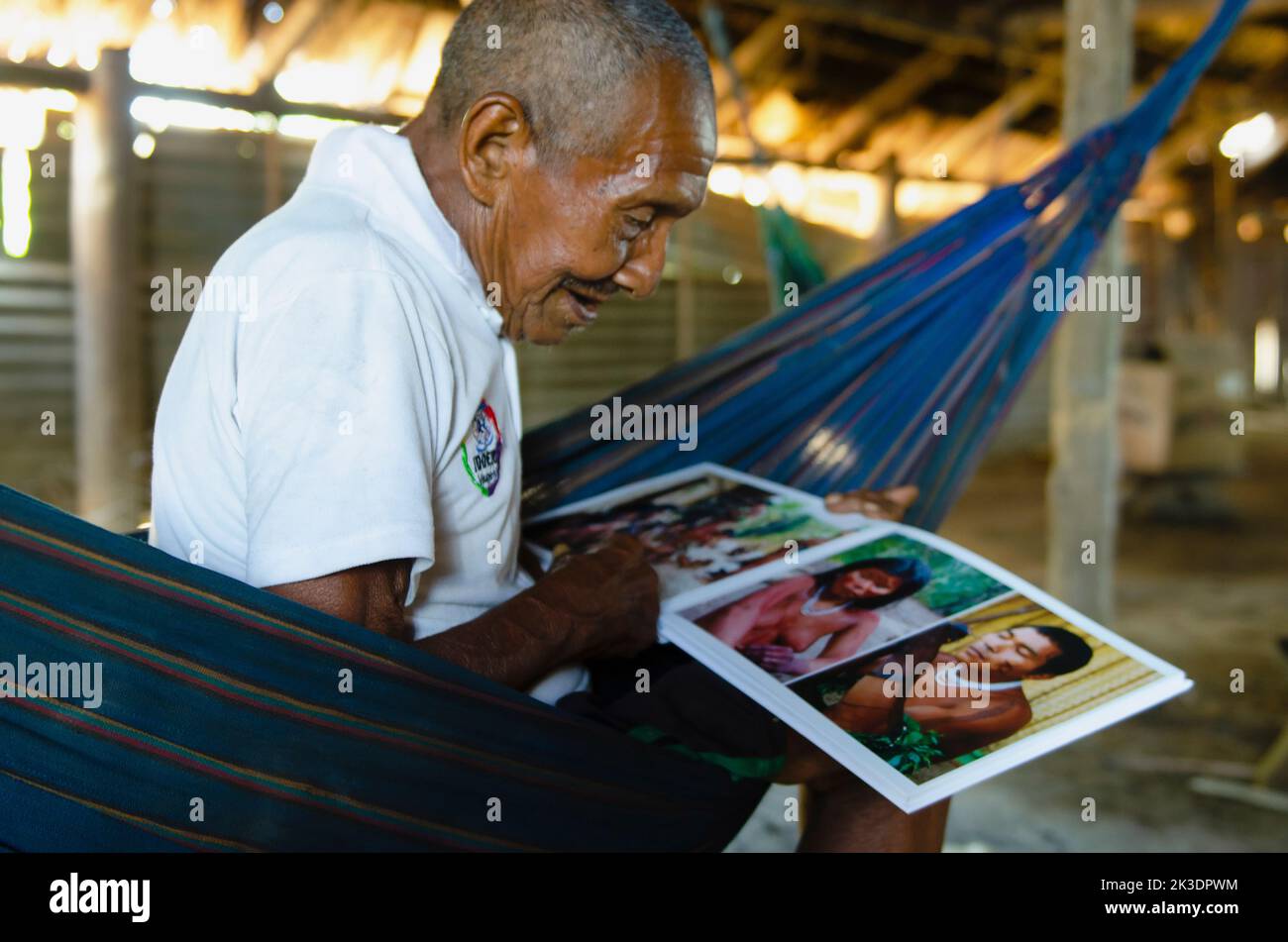 Colombia, Piraparana, Sta. Isabel, The shaman Ignacio looking at a ...