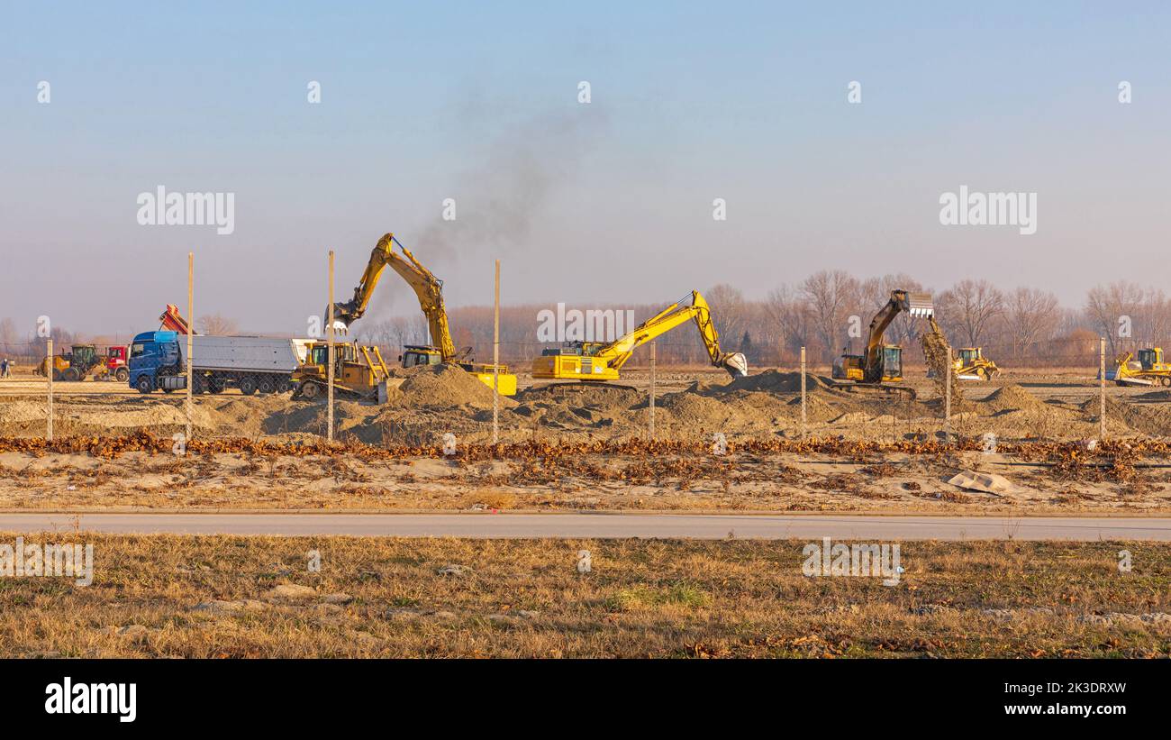 Digger Excavation at New Construction Site Ground Works Stock Photo - Alamy
