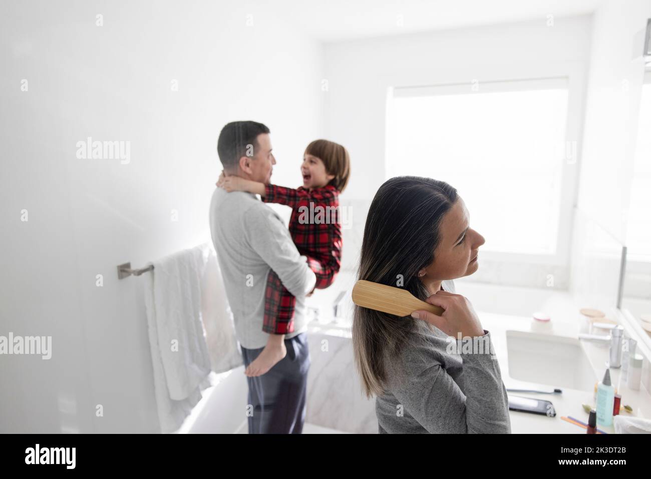 Husband hugging wife in bathroom hi-res stock photography and images ...