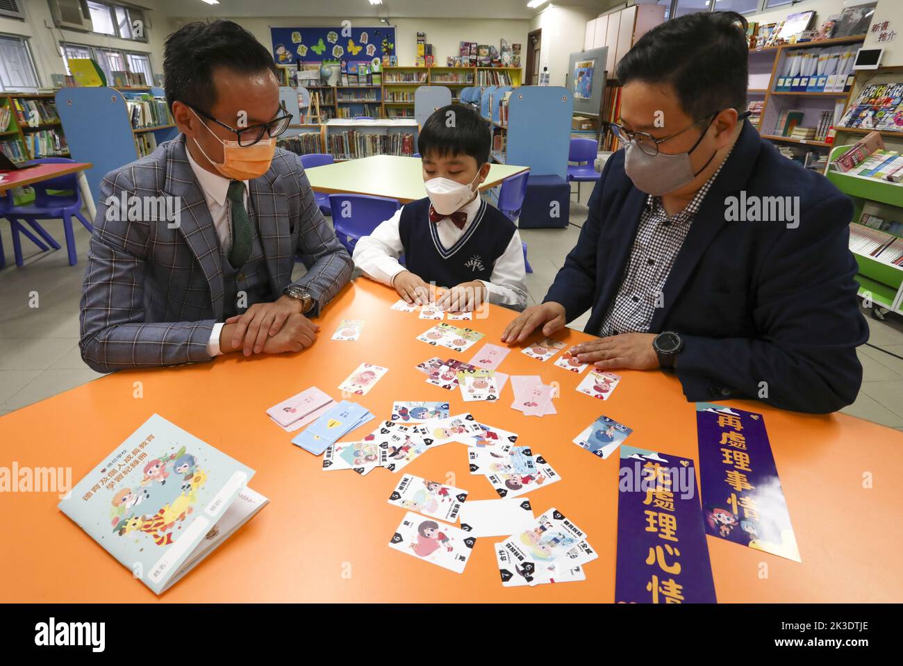 (L to R) Tak Sun School principal Kwok Chiu Kwan, with student Colin ...