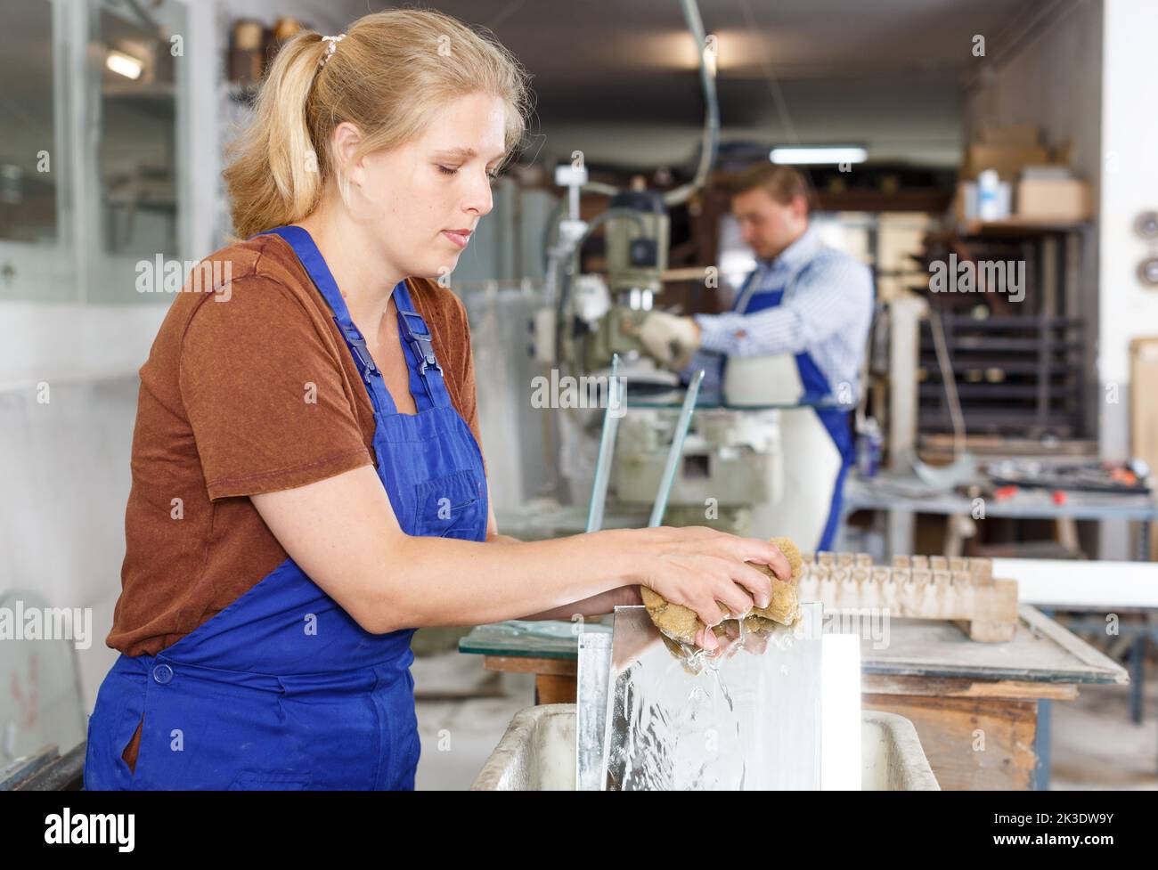 Female worker cleaning glass Stock Photo - Alamy Female worker cleaning glass Stock Photo - Alamy