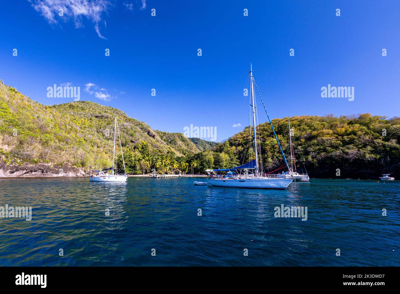 Martinique, town of Les Anses-d'Arlet: sailboats facing the village of ...