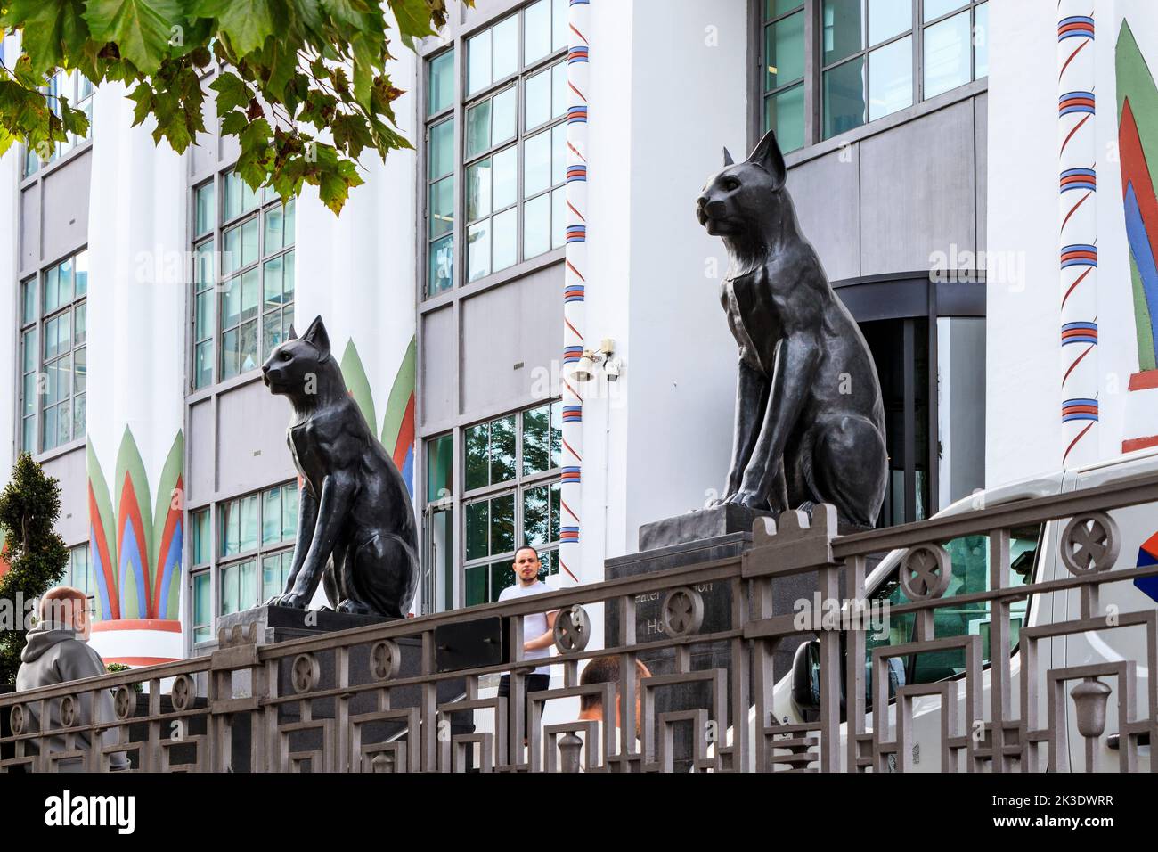 Black cats on guard at Greater London House, a large Art Deco building ...