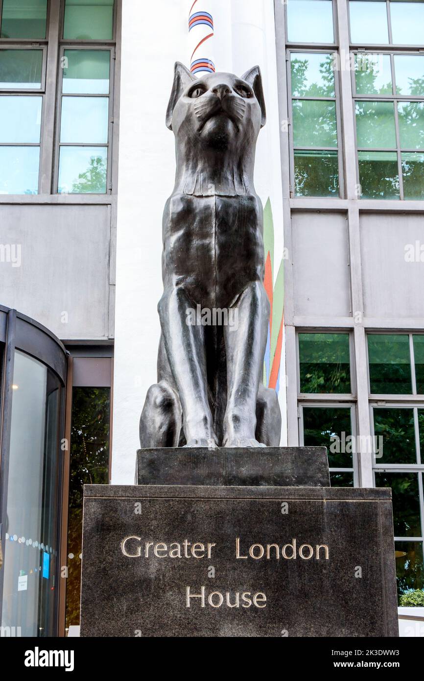 Black cats on guard at Greater London House, a large Art Deco building ...