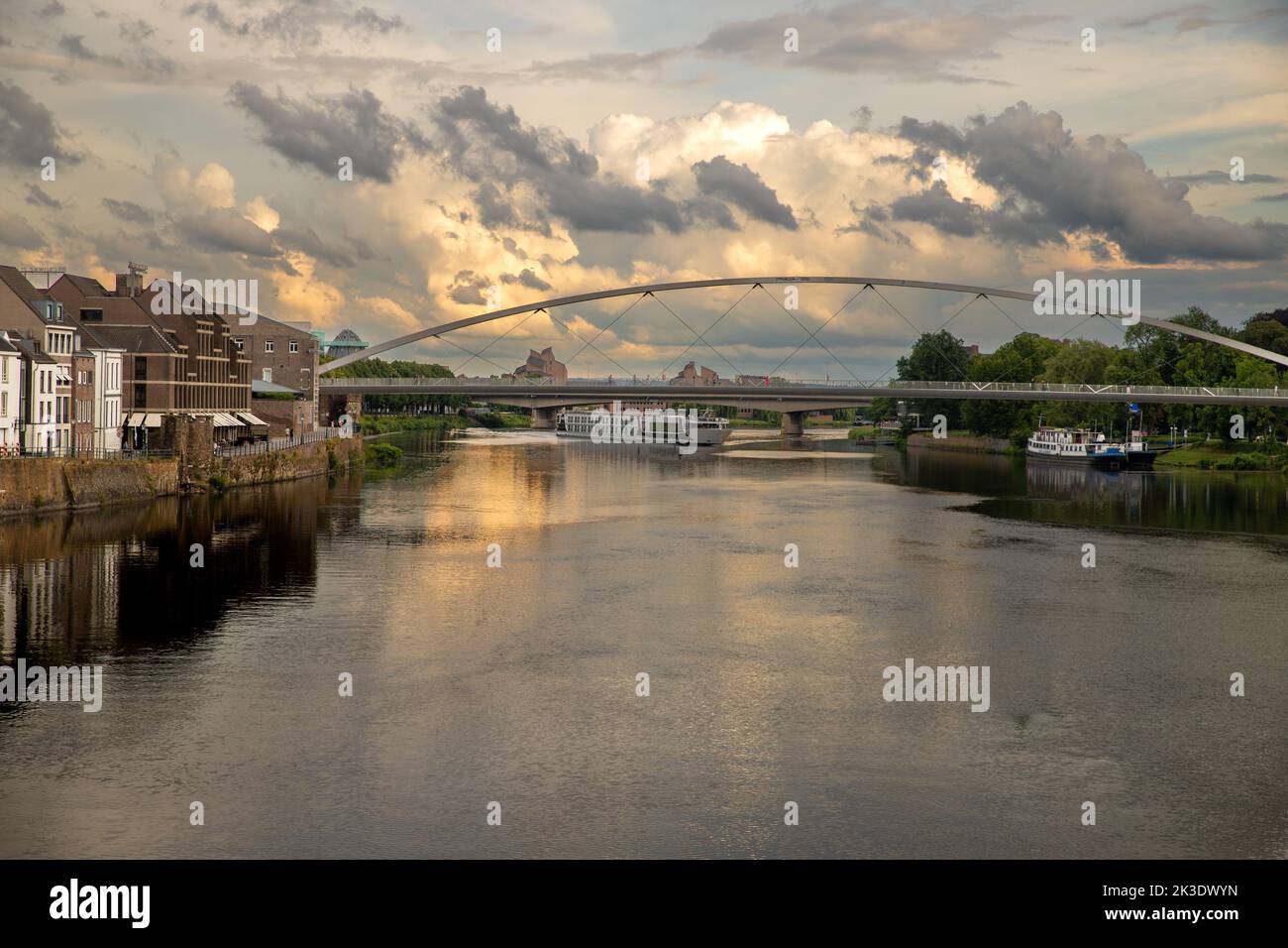A beautiful bridge over a water canal in the daytime Stock Photo - Alamy