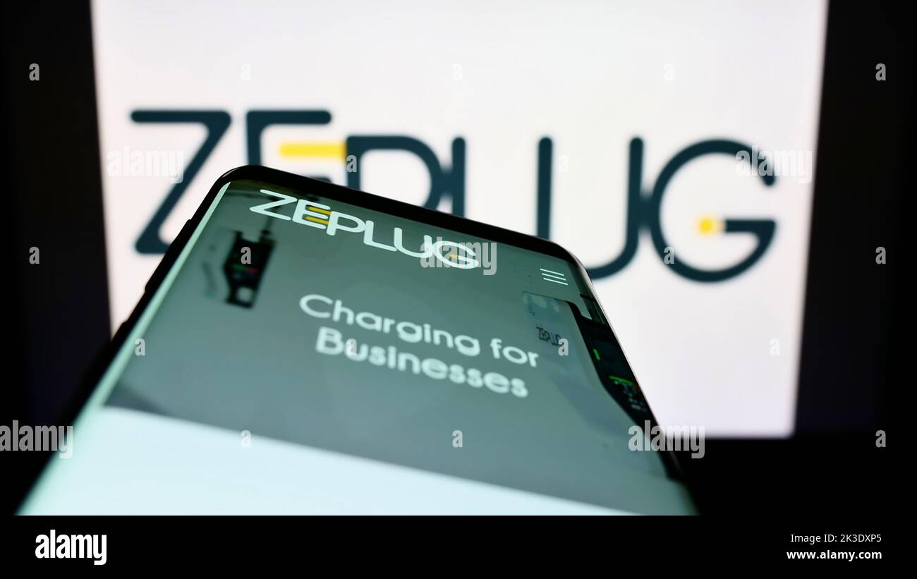 Mobile phone with website of French EV charging company Zeplug SAS on ...