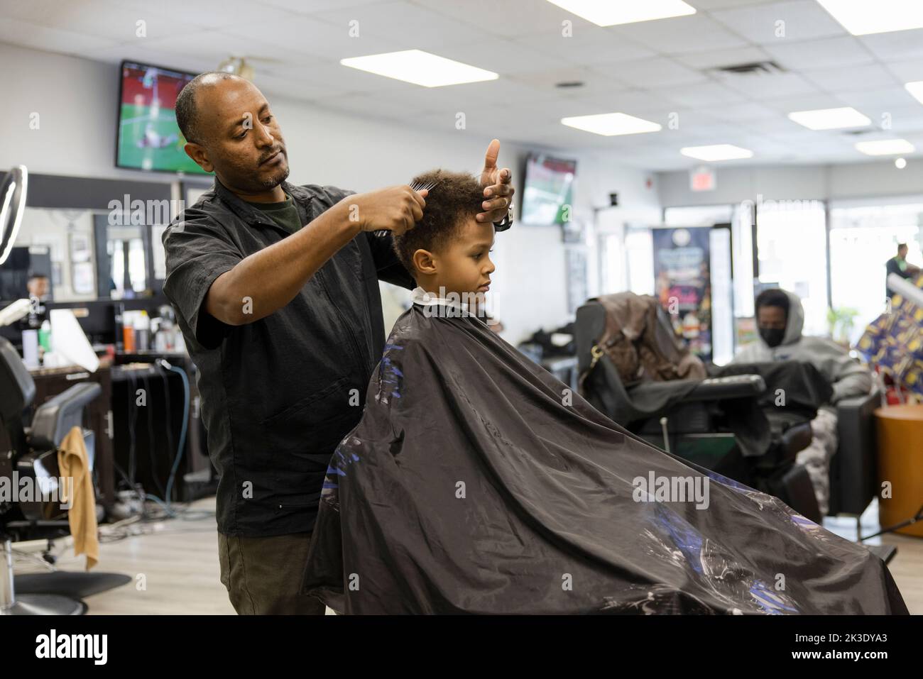 Barber boy hi-res stock photography and images - Alamy