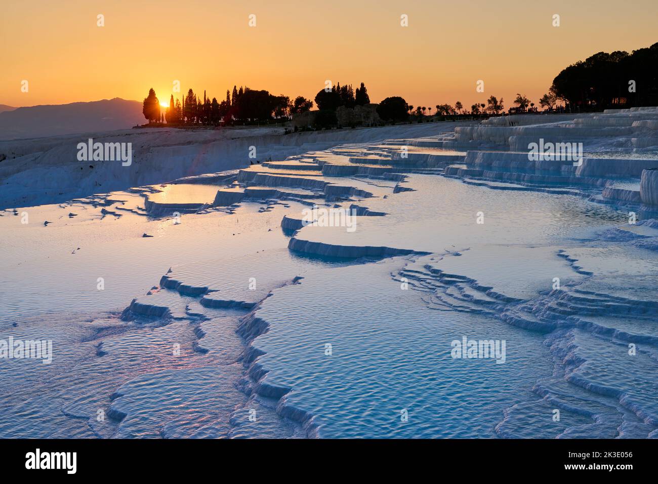 sunset behind Pamukkale travertine terraces, Denizli, Turkey Stock ...