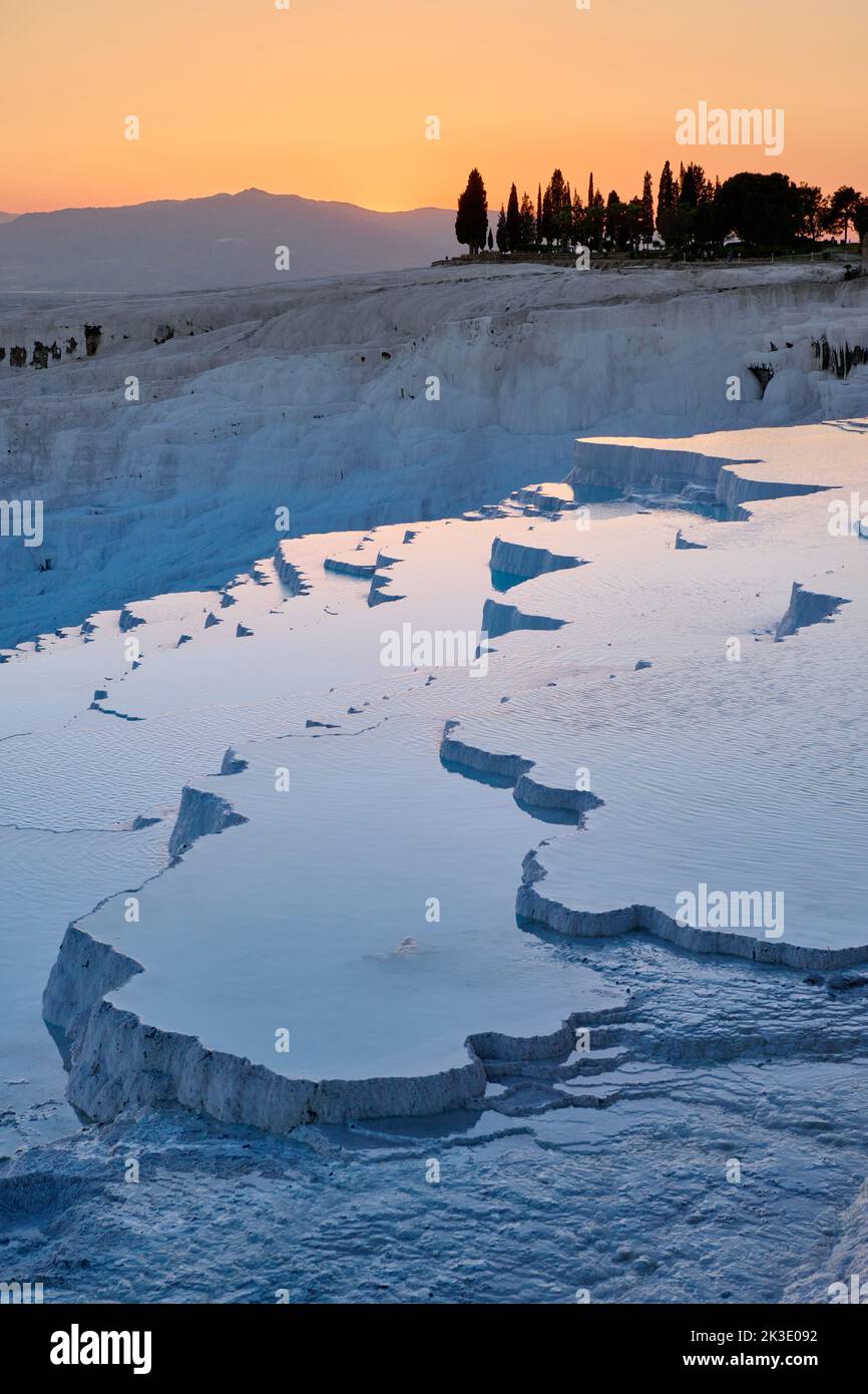 sunset behind Pamukkale travertine terraces, Denizli, Turkey Stock ...