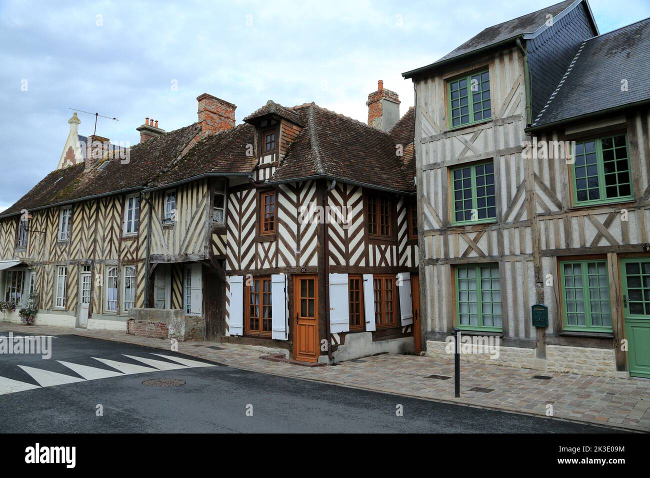 Half timbered colombage buildings in Rue Michel d'Ornano, Beuvron en ...