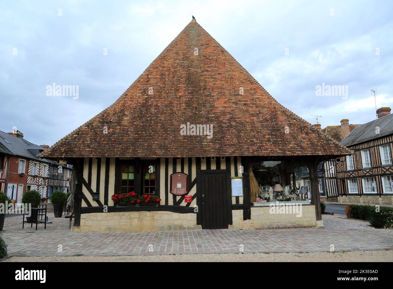 Half timbered colombage building with pitched tile roof in Place Michel ...