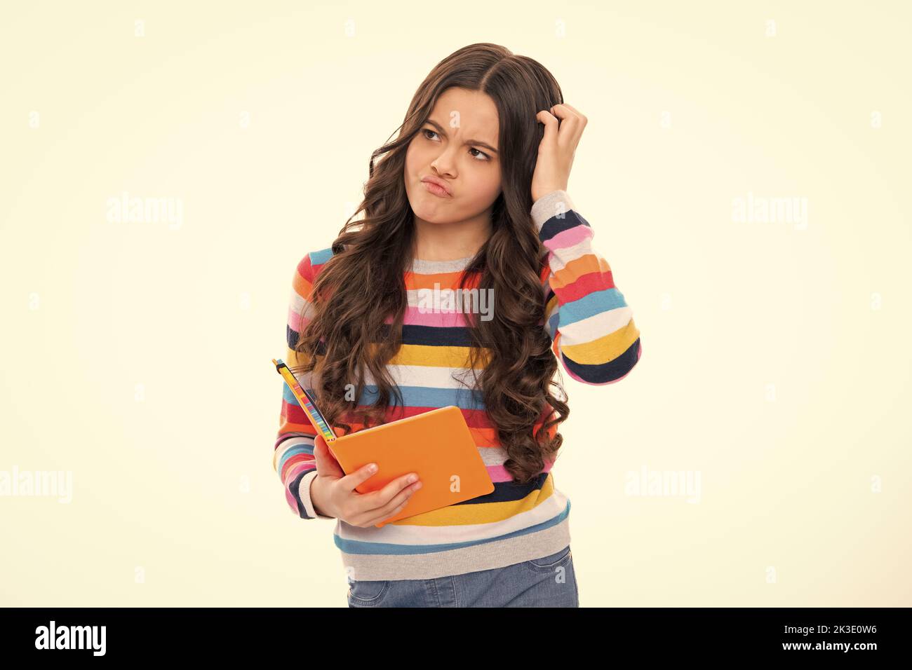 Schoolgirl with copy book posing on isolated background. Literature ...