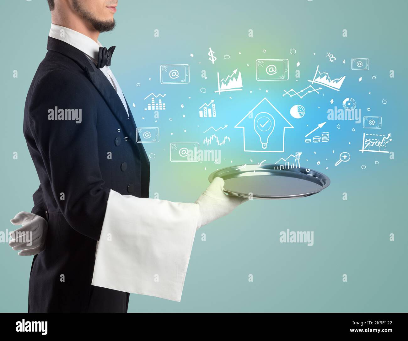 Handsome young waiter in tuxedo holding money icons on tray Stock Photo ...