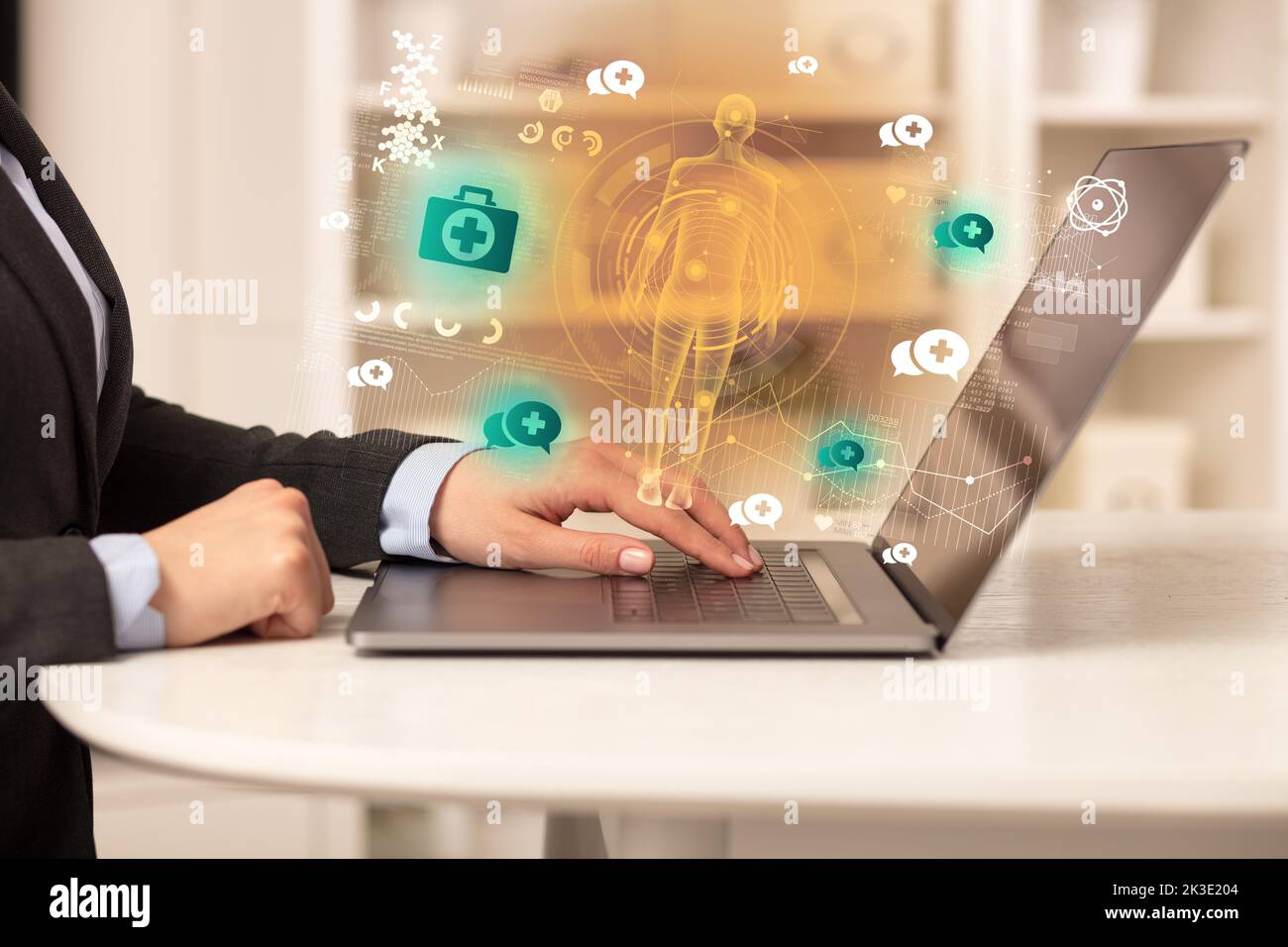Doctor working on laptop with healthcare concept Stock Photo - Alamy