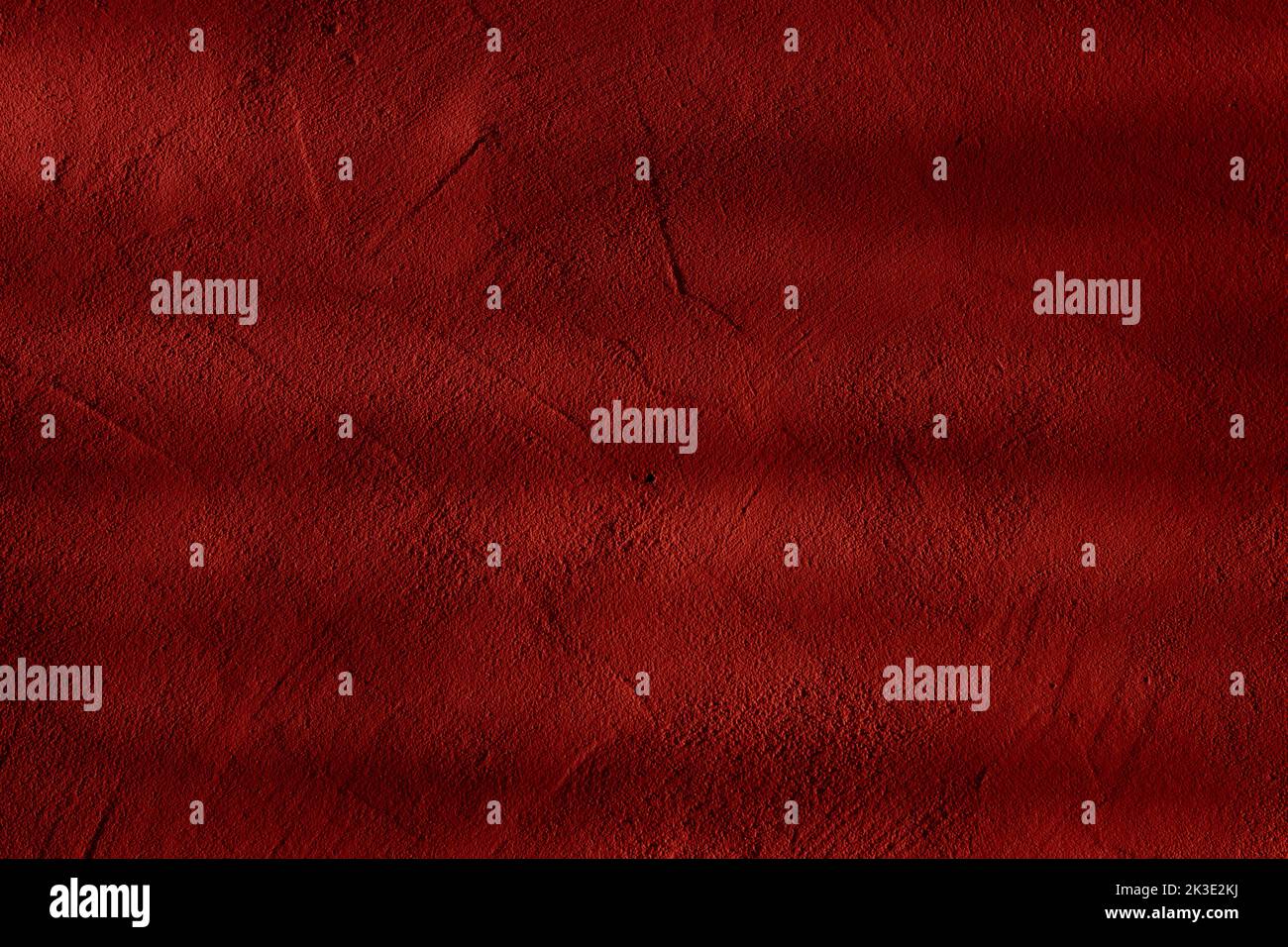Crimson colored wall background with textures of different shades of ...