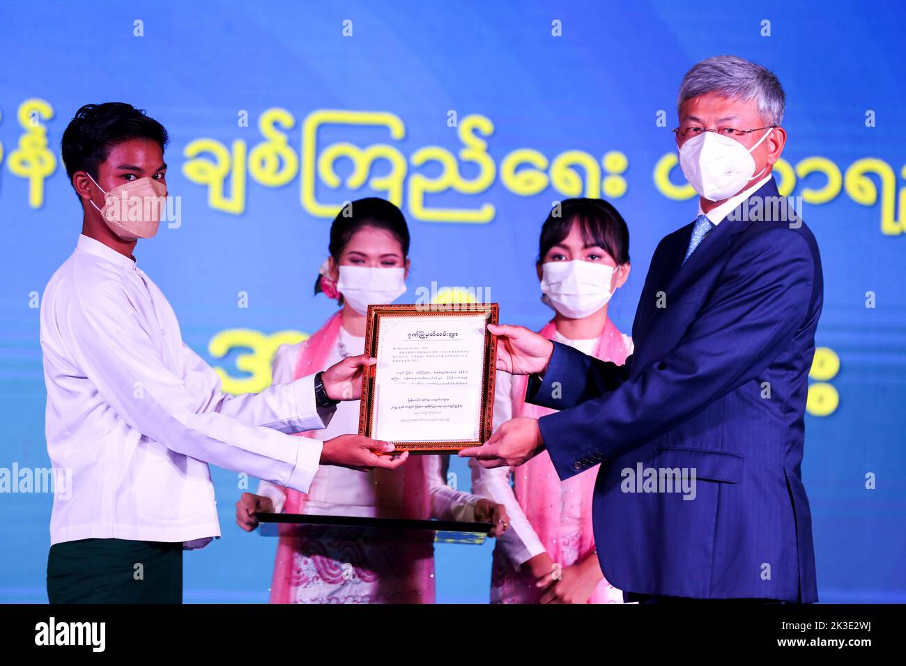 Yangon, Myanmar. 26th Sep, 2022. Chinese Ambassador to Myanmar Chen Hai (1st R) gives the ...