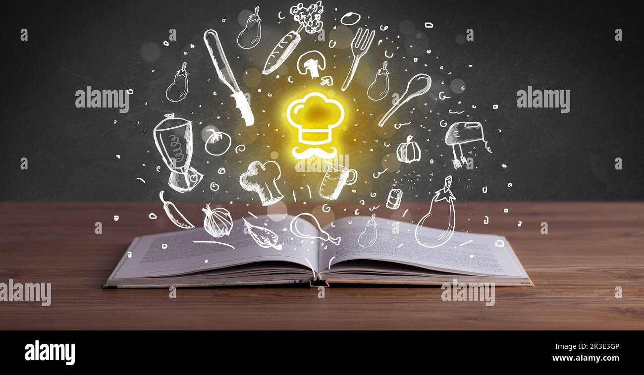 Open recipe book with food related icons above Stock Photo - Alamy