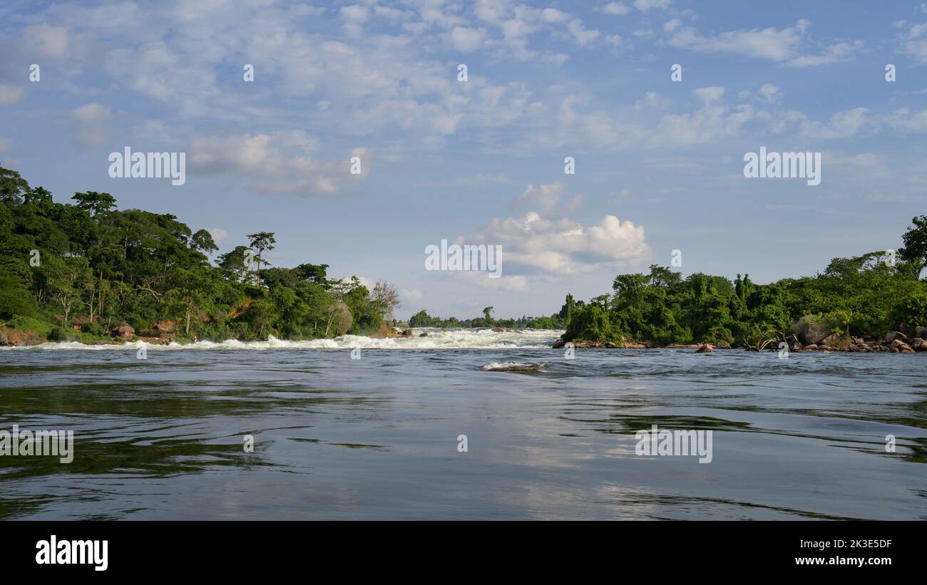 The Itanda Falls of the Victoria Nile in Uganda, sunny day in May Stock ...