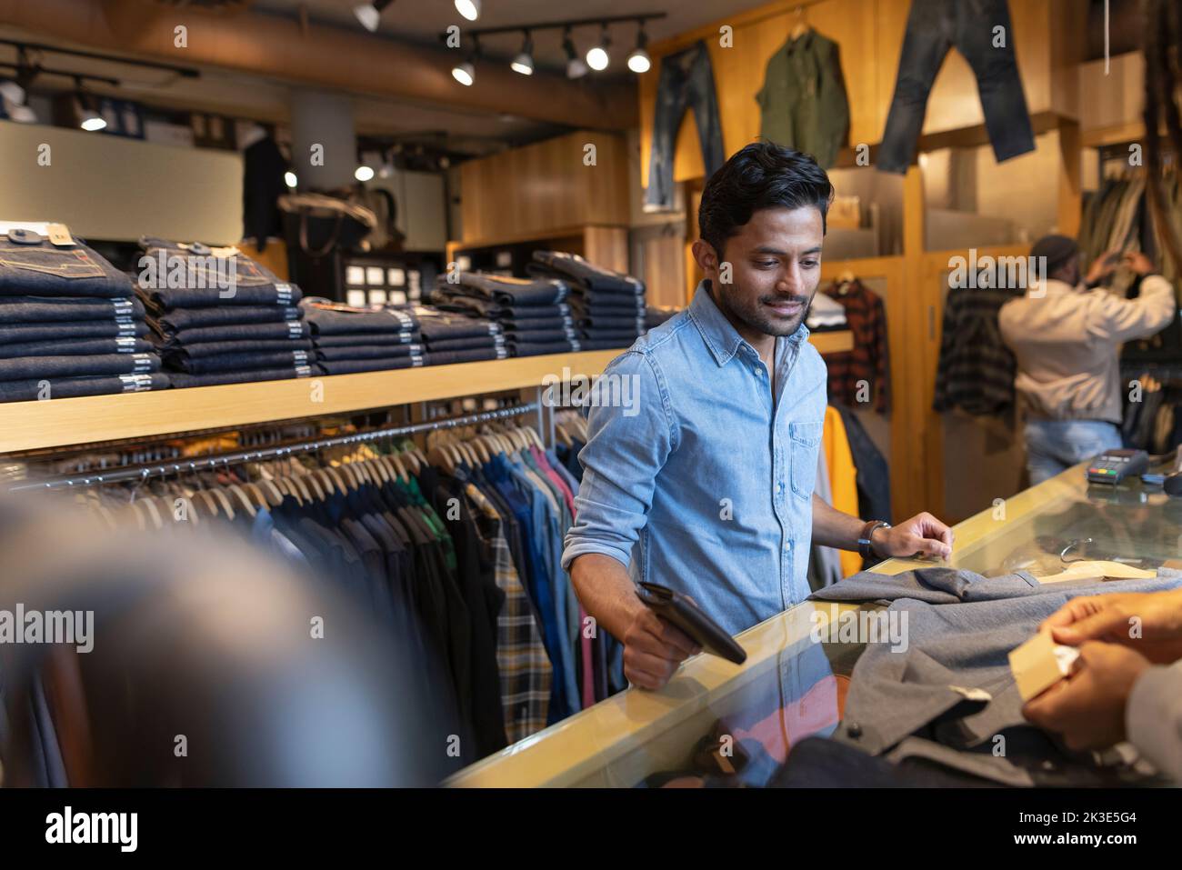 Buying counter hi-res stock photography and images - Alamy