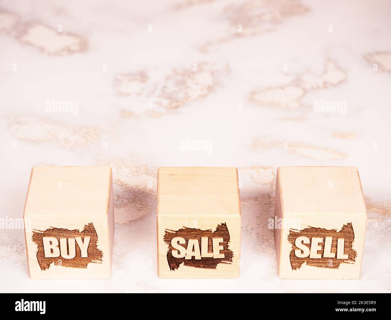 BUY, SELL and SALE symbols on wooden cubes as a sales management ...