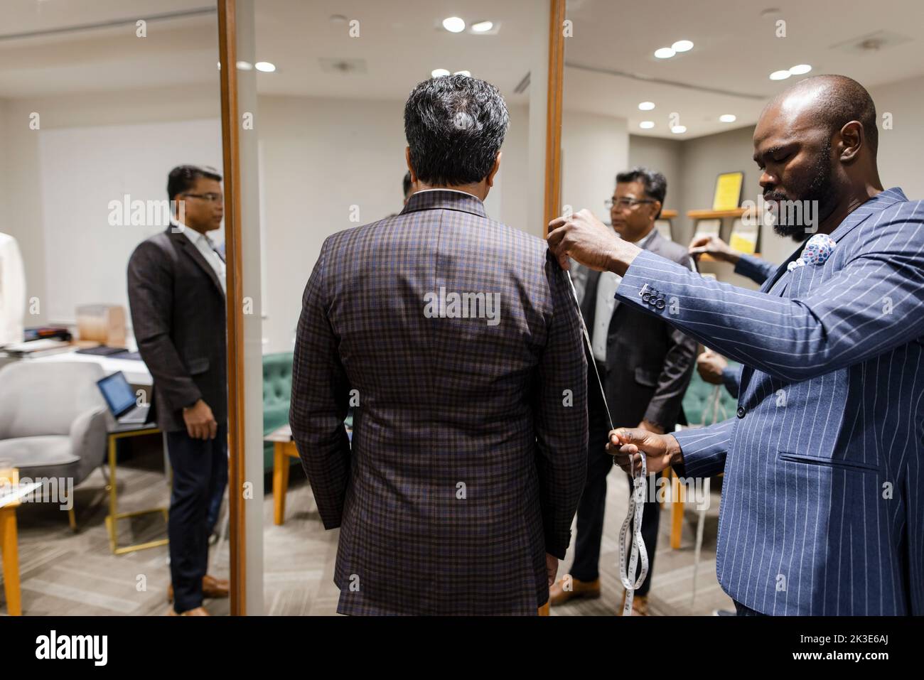 Tailor measuring business man for suit hi-res stock photography and ...