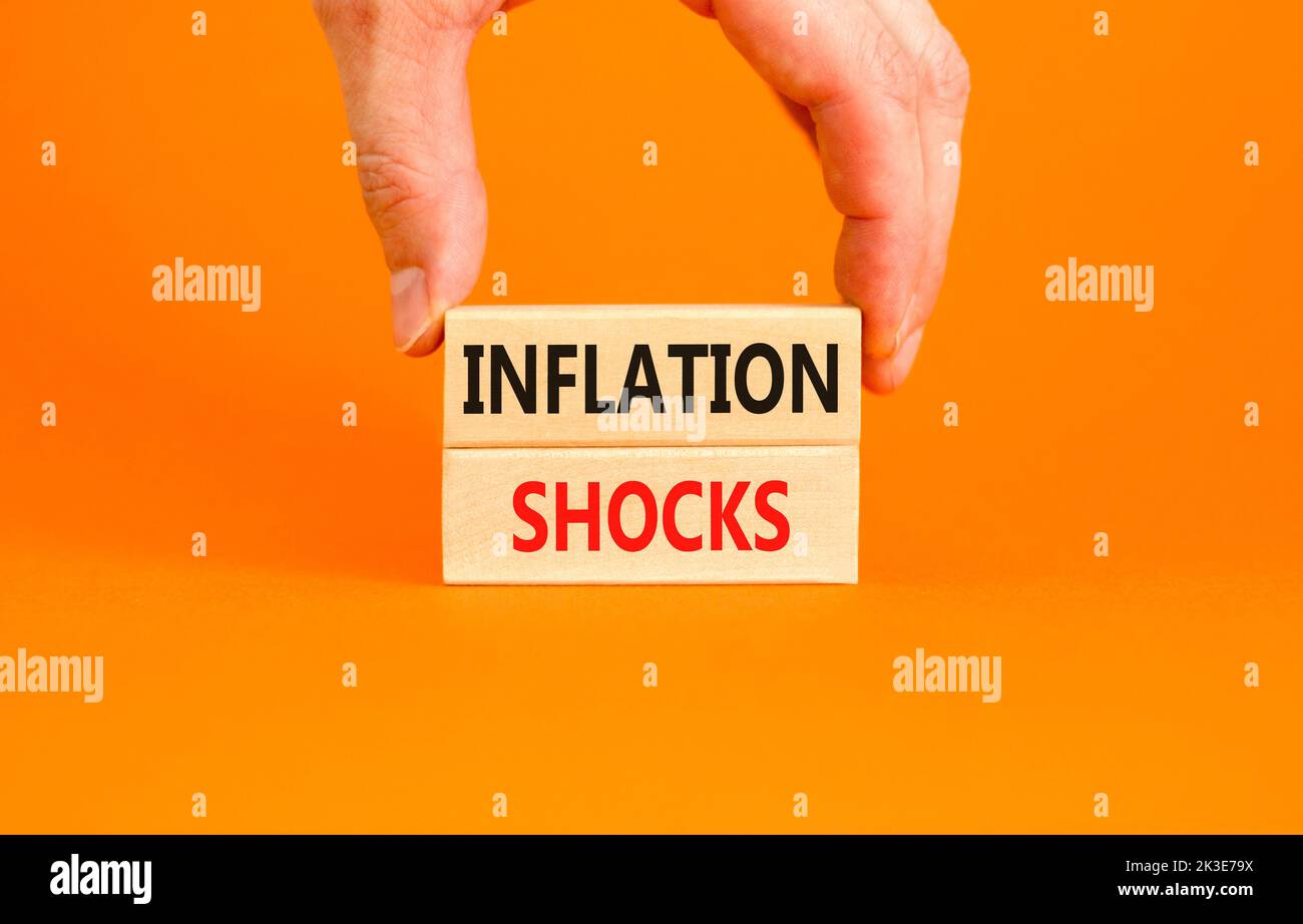 Inflation shocks symbol. Concept words Inflation shocks on wooden ...