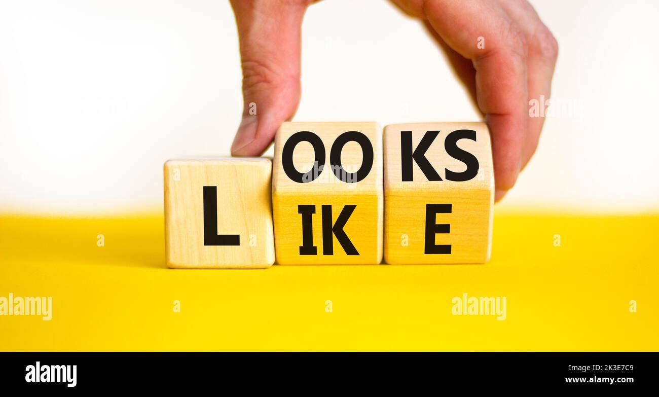 Looks like symbol. Concept words Looks like on wooden cubes ...