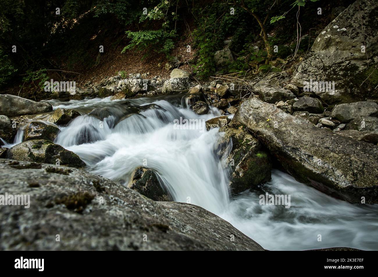 River flowing through rocks hi-res stock photography and images - Alamy