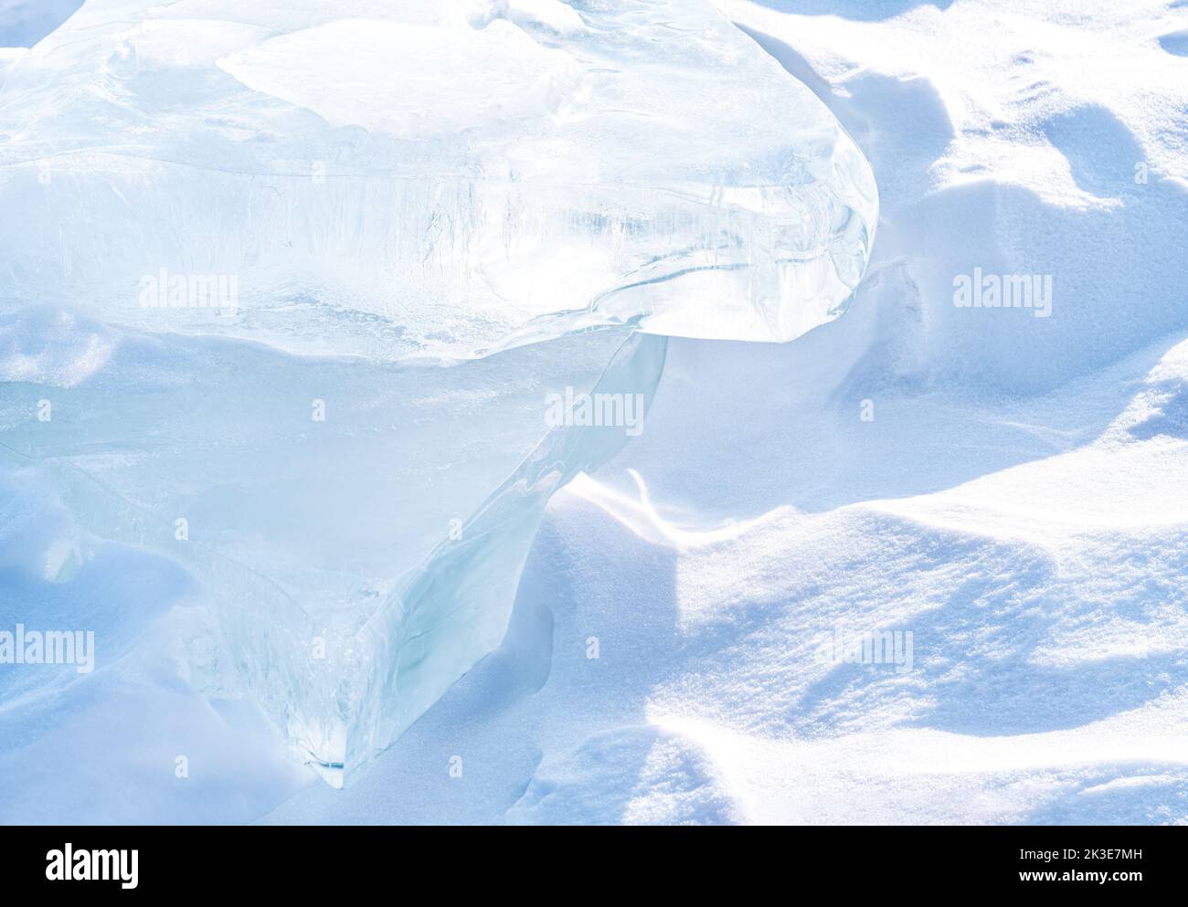 Ice hummocks on Baikal Lake. Transparent blue ice floe at sunset ...