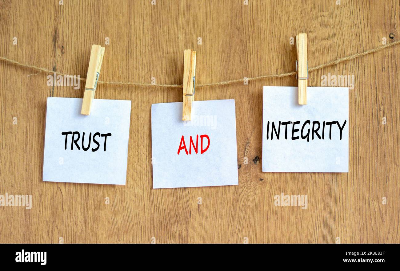 Trust and integrity symbol. Concept words Trust and integrity on white ...
