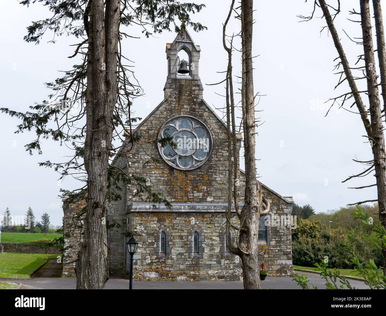An old Christian church in Ireland. Cloudy weather and cloudy sky ...