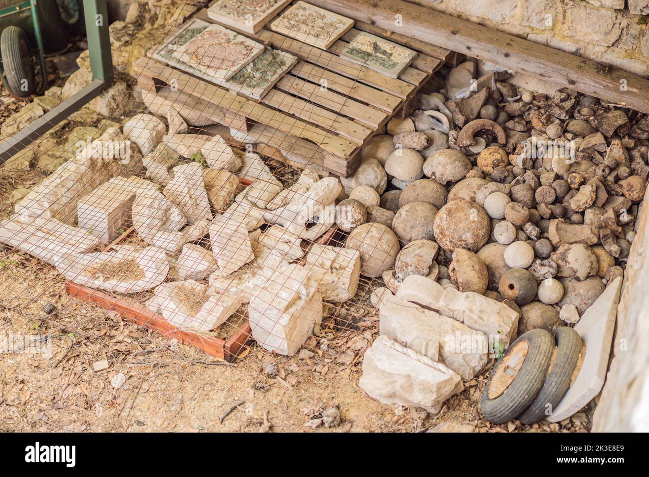 Large vintage stone cannon balls on a blurred background Stock Photo ...