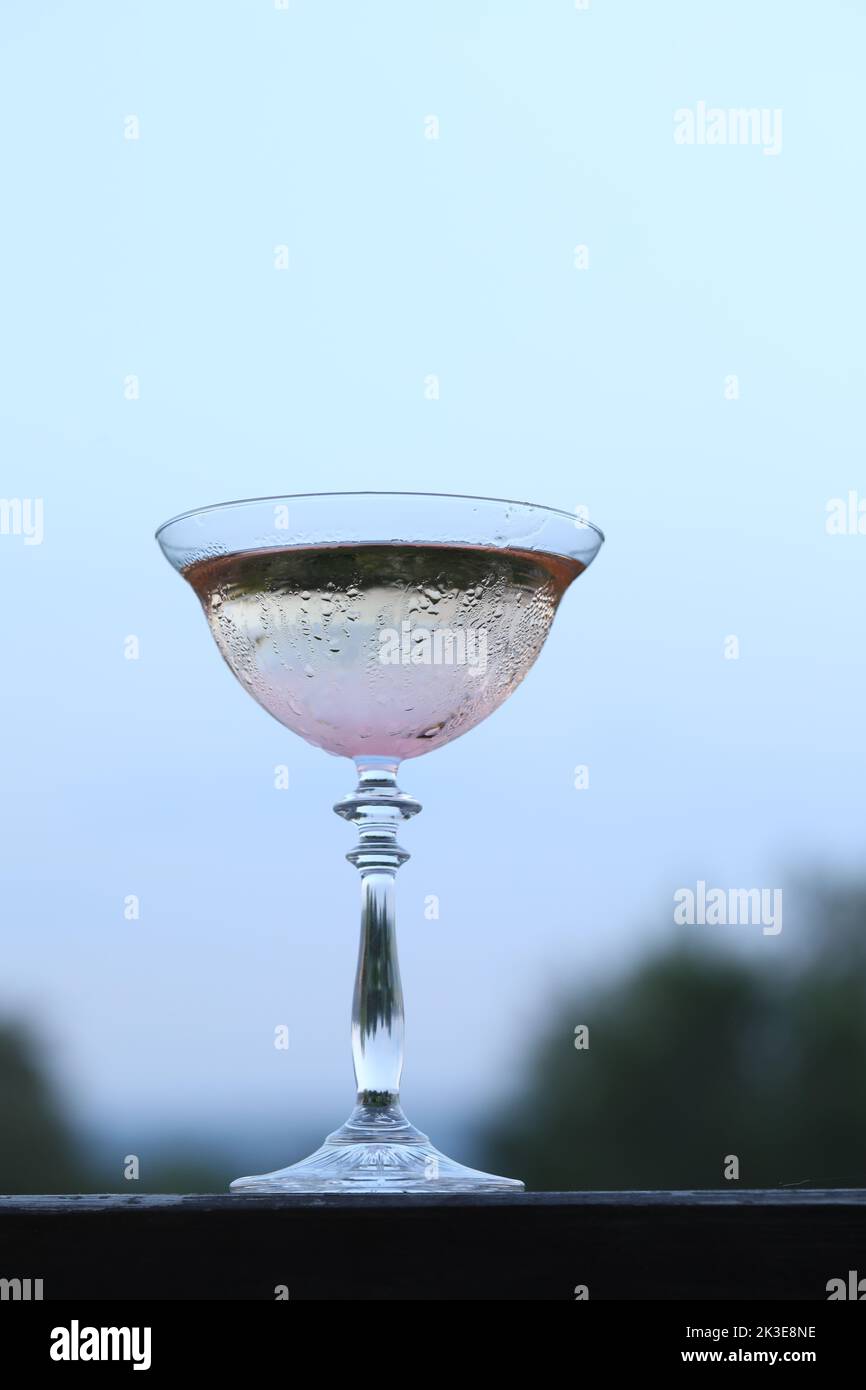 wine glass with cold fruit cocktail with copy space Stock Photo - Alamy