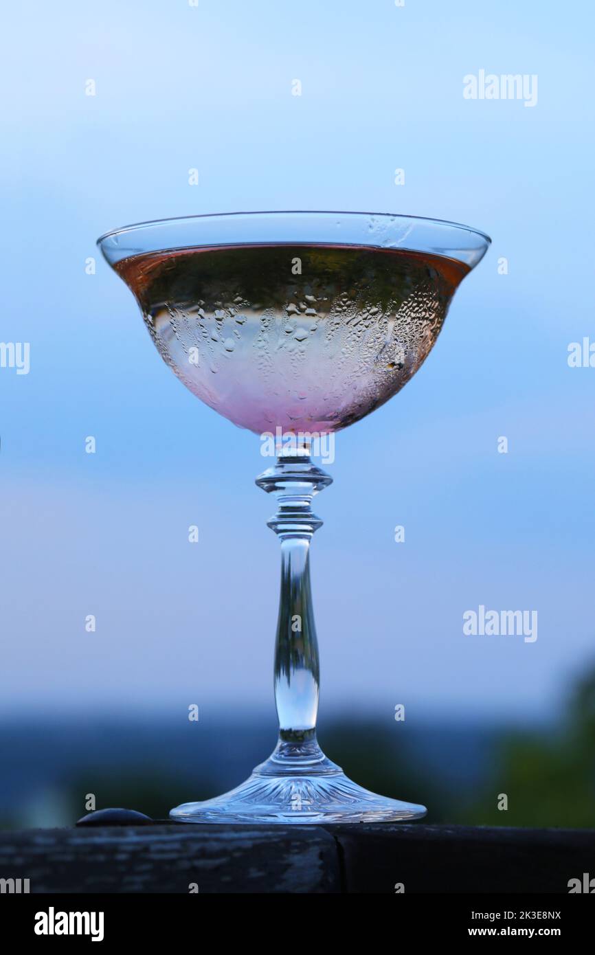 wine glass with cold fruit cocktail with copy space Stock Photo - Alamy