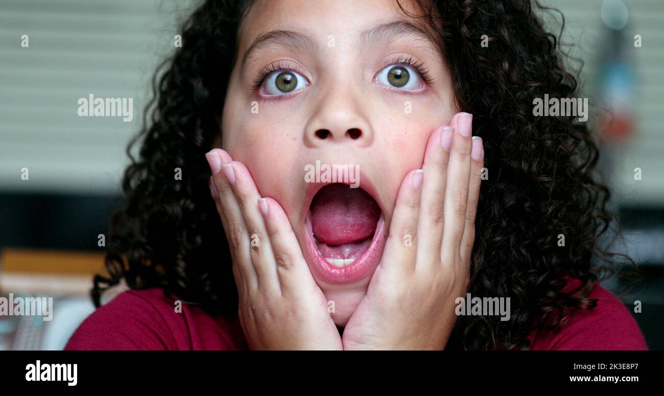 Child surprised reaction to news. excited amazed little girl Stock ...