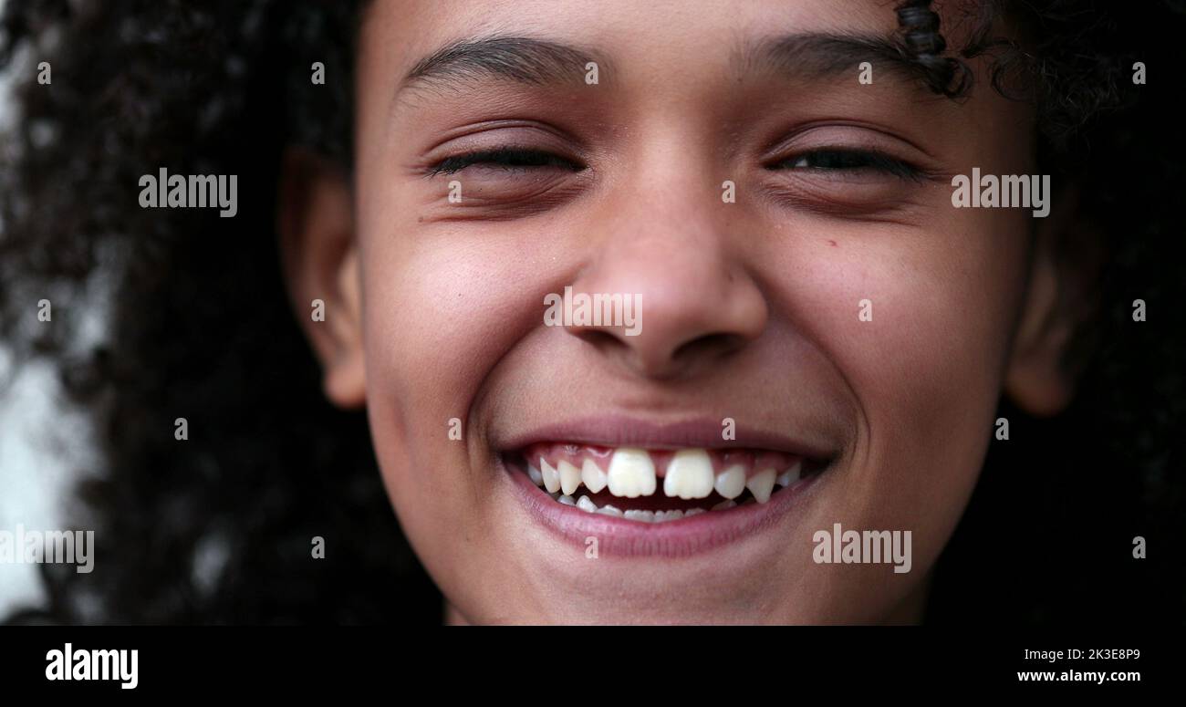 Child real life laugh and smile. Little African girl reacting laughing ...