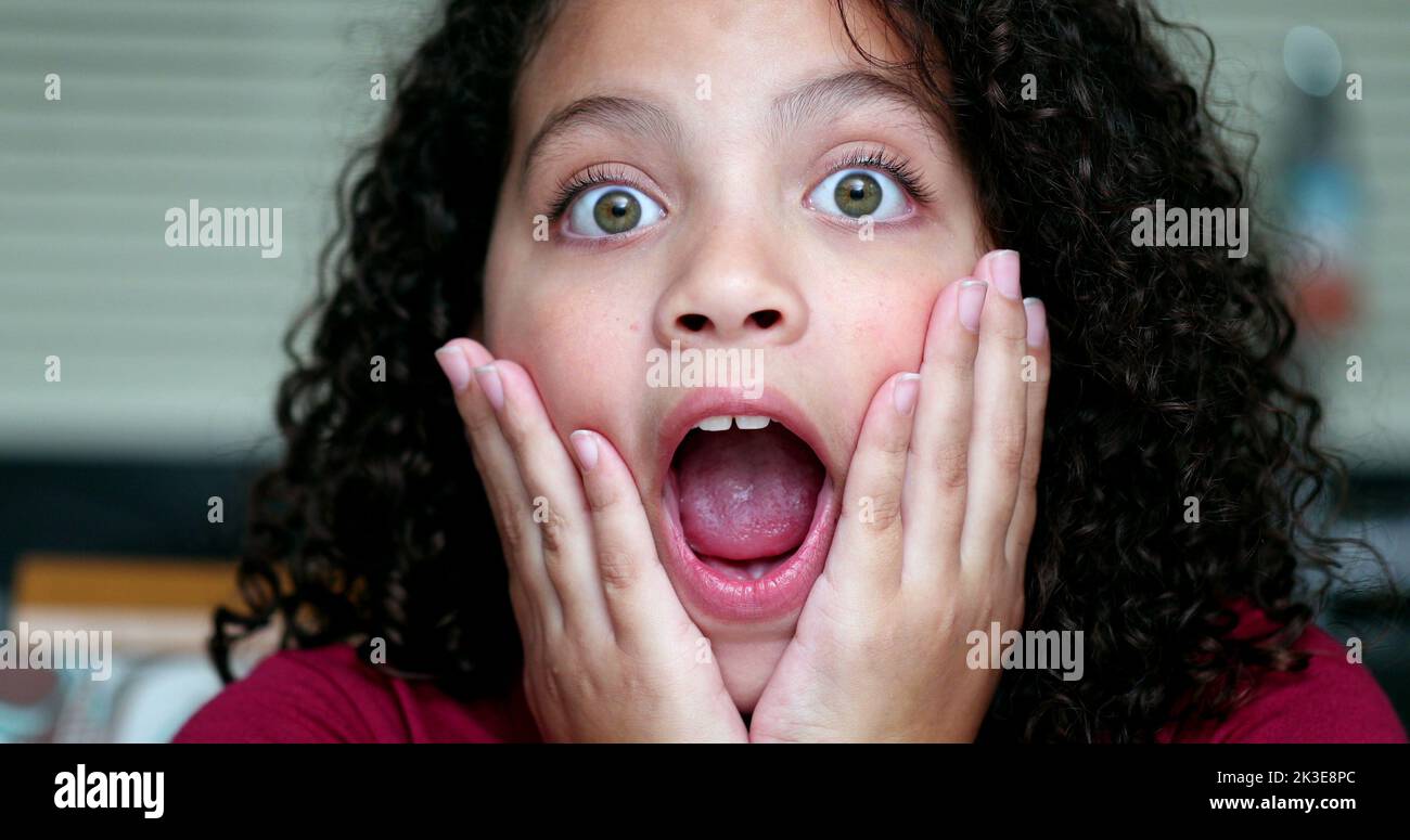 Child surprised reaction to news. excited amazed little girl Stock ...