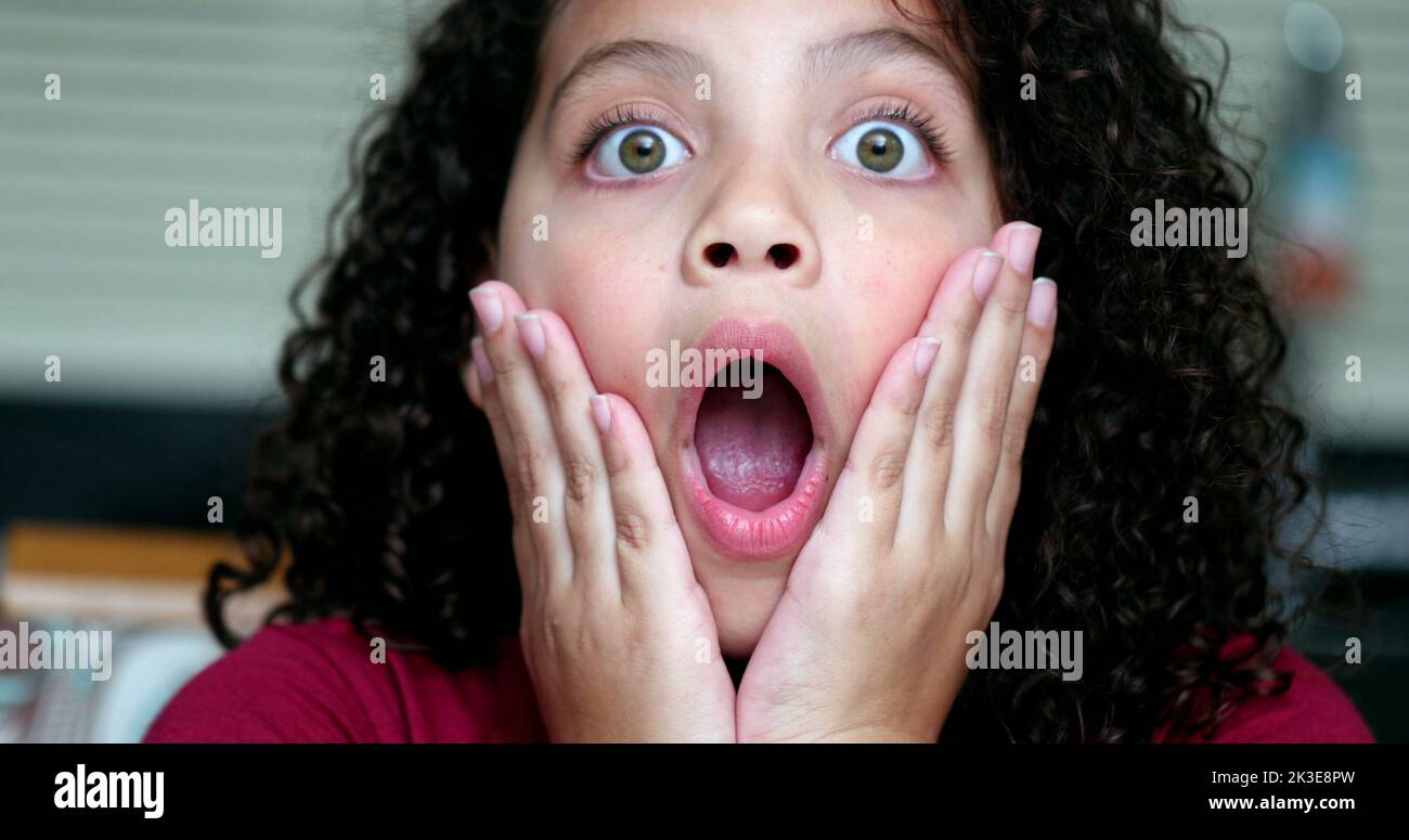 Child surprised reaction to news. excited amazed little girl Stock ...