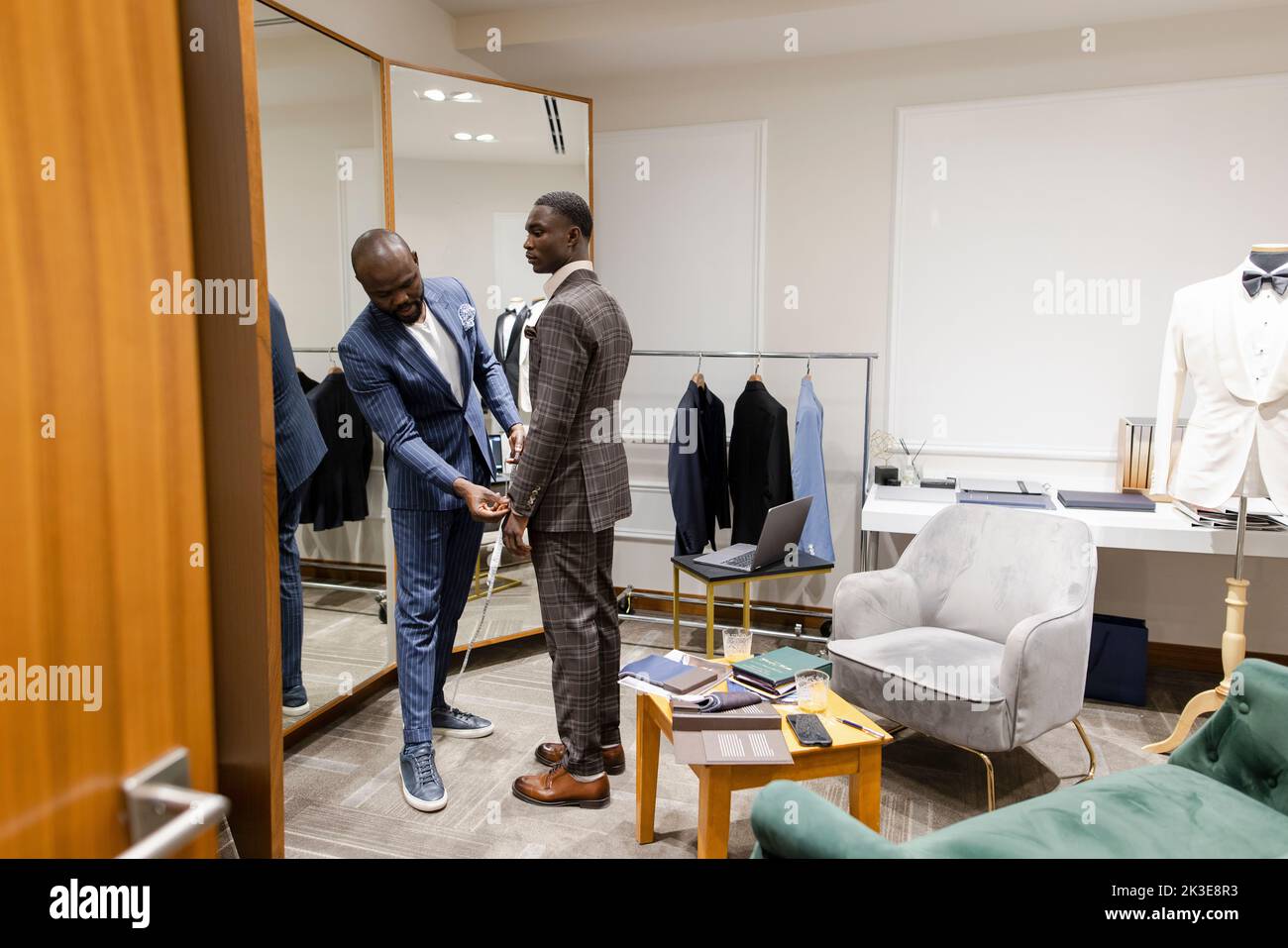 Tailor measuring business man for suit hi-res stock photography and ...