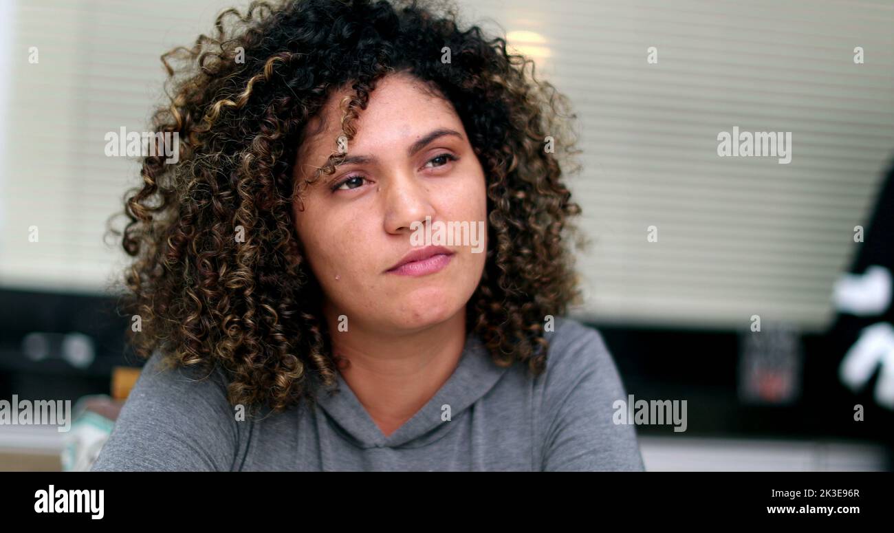 Contemplative woman thinking. Person lost in thought Stock Photo - Alamy