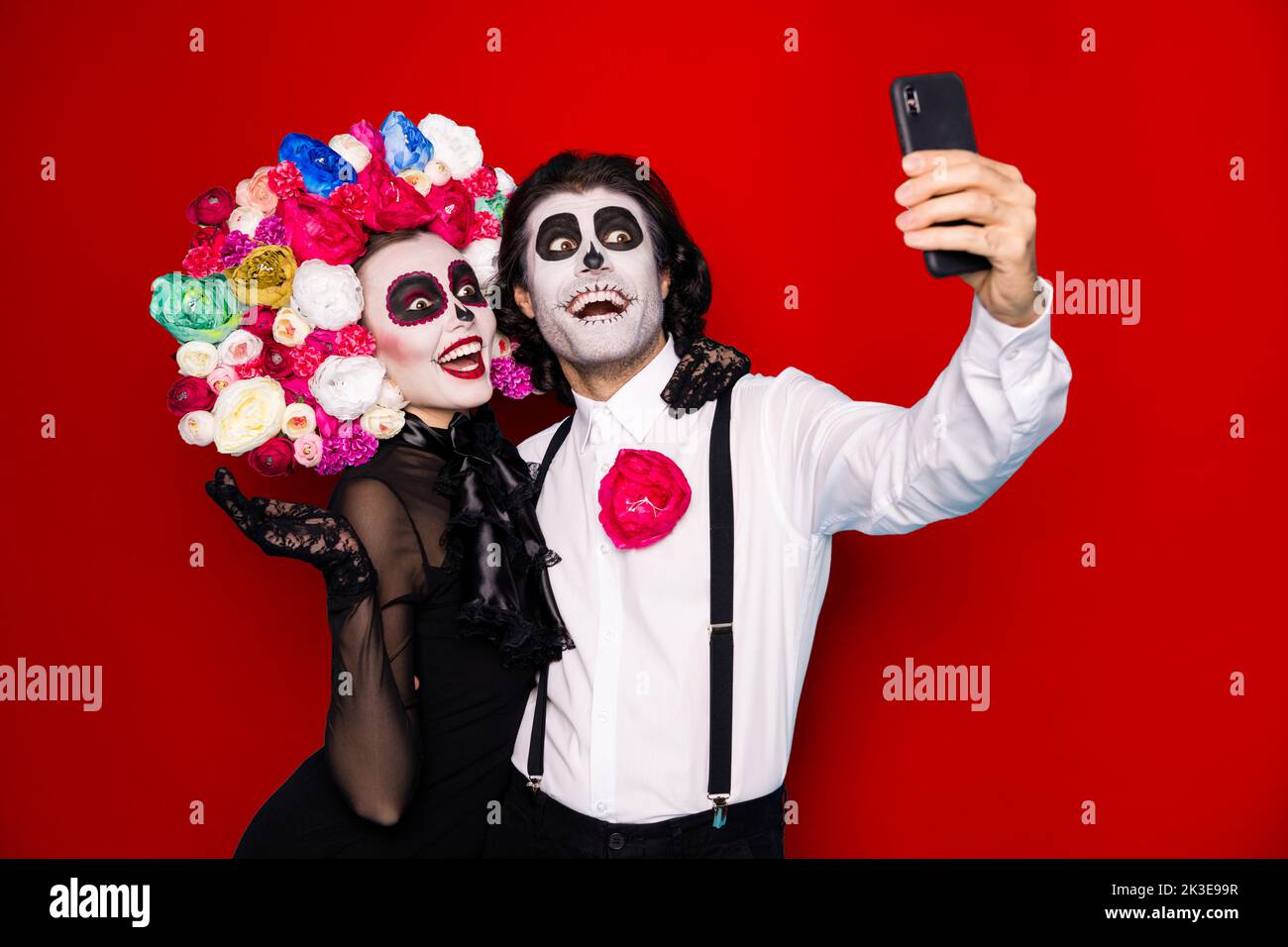 Photo of creepy couple man lady cuddle hold telephone make selfie video ...