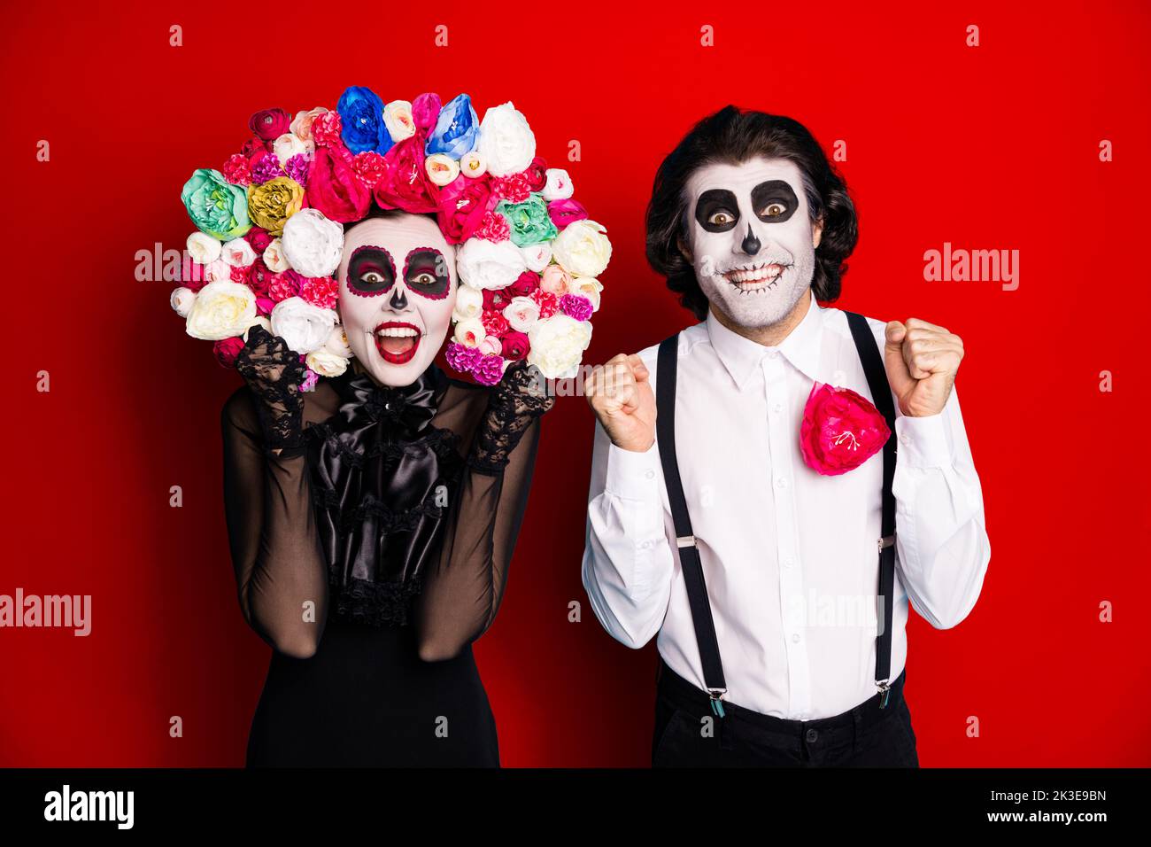 Photo of scary two people man lady surprised raise fists win undead ...