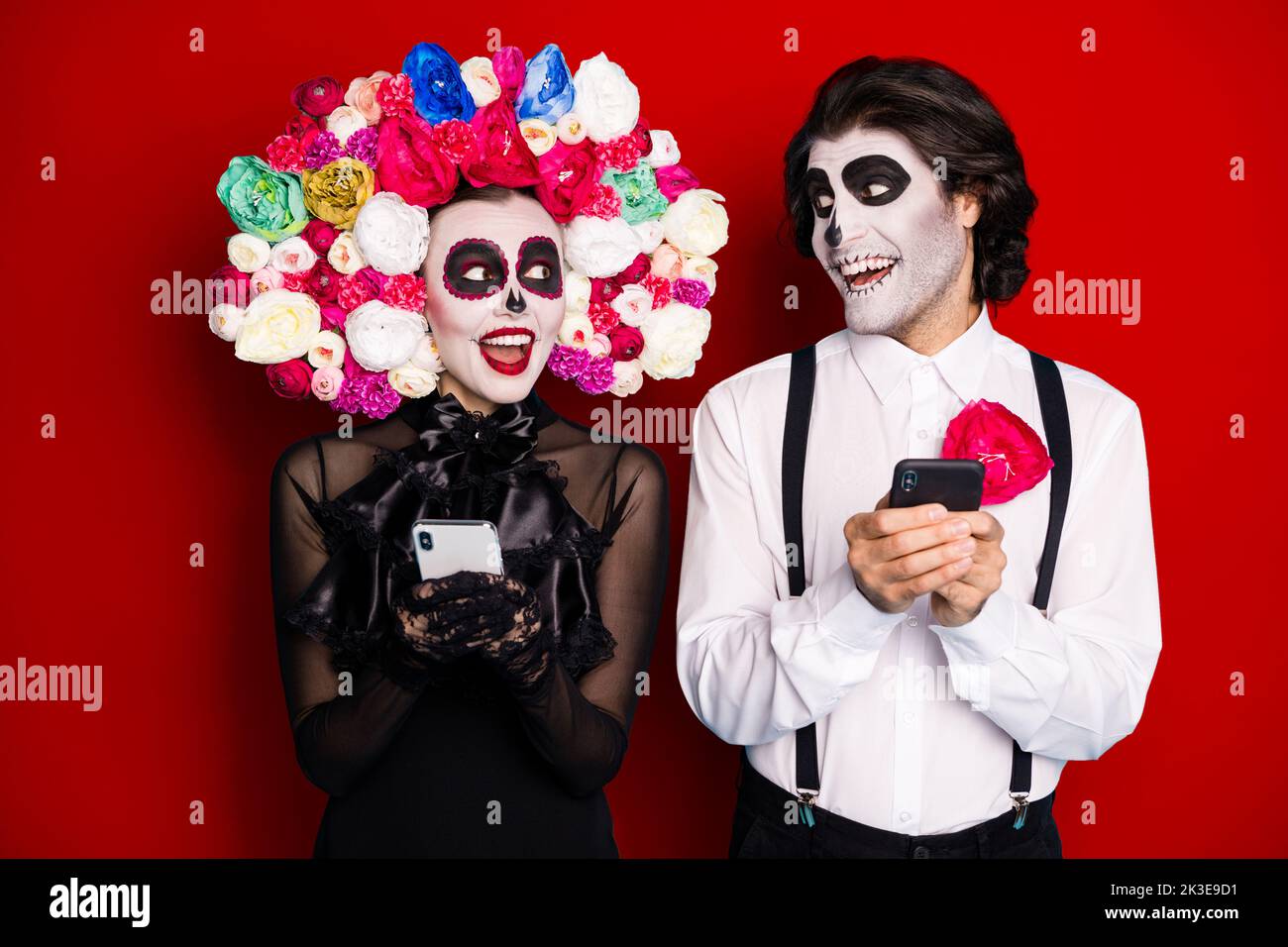 Photo of creepy couple man lady hold telephones read dark humor jokes ...