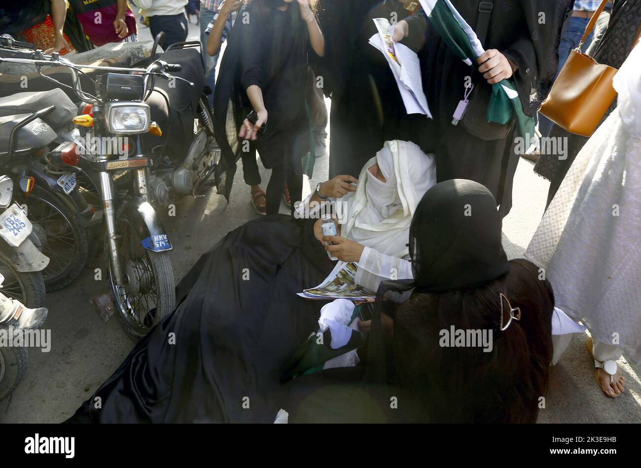 Hyderabad, Pakistan, September 26, 2022. Relatives of Irfan Basarat are ...