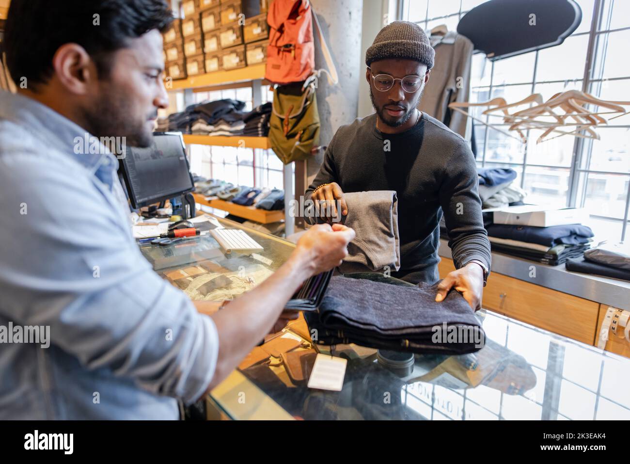 Buying clothing hi-res stock photography and images - Alamy