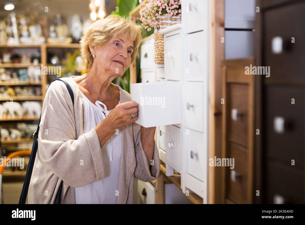 Woman searching drawer hi-res stock photography and images - Alamy