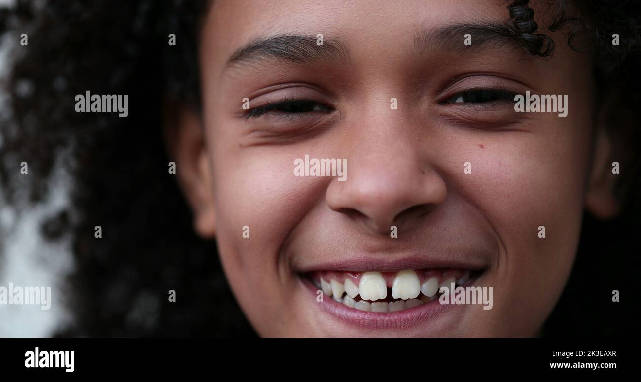 Child real life laugh and smile. Little African girl reacting laughing ...