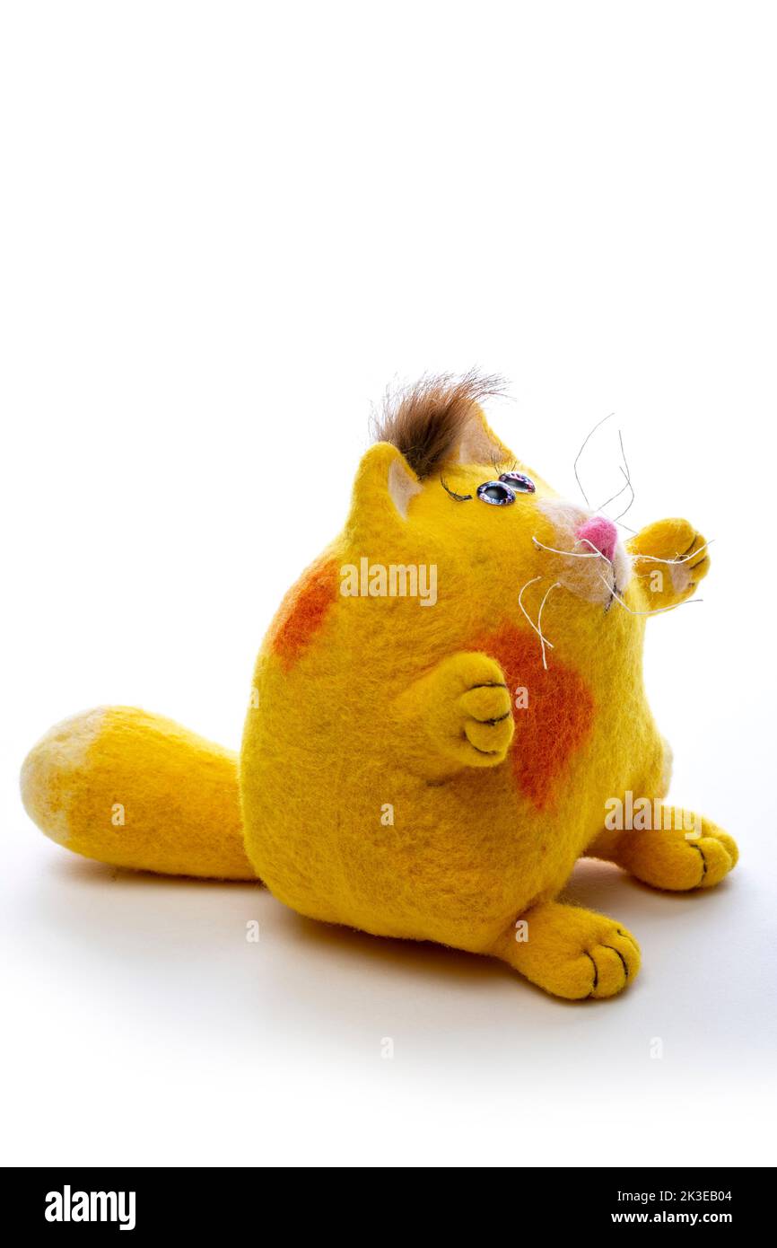 Yellow cat - soft toy made of felt wool Stock Photo - Alamy
