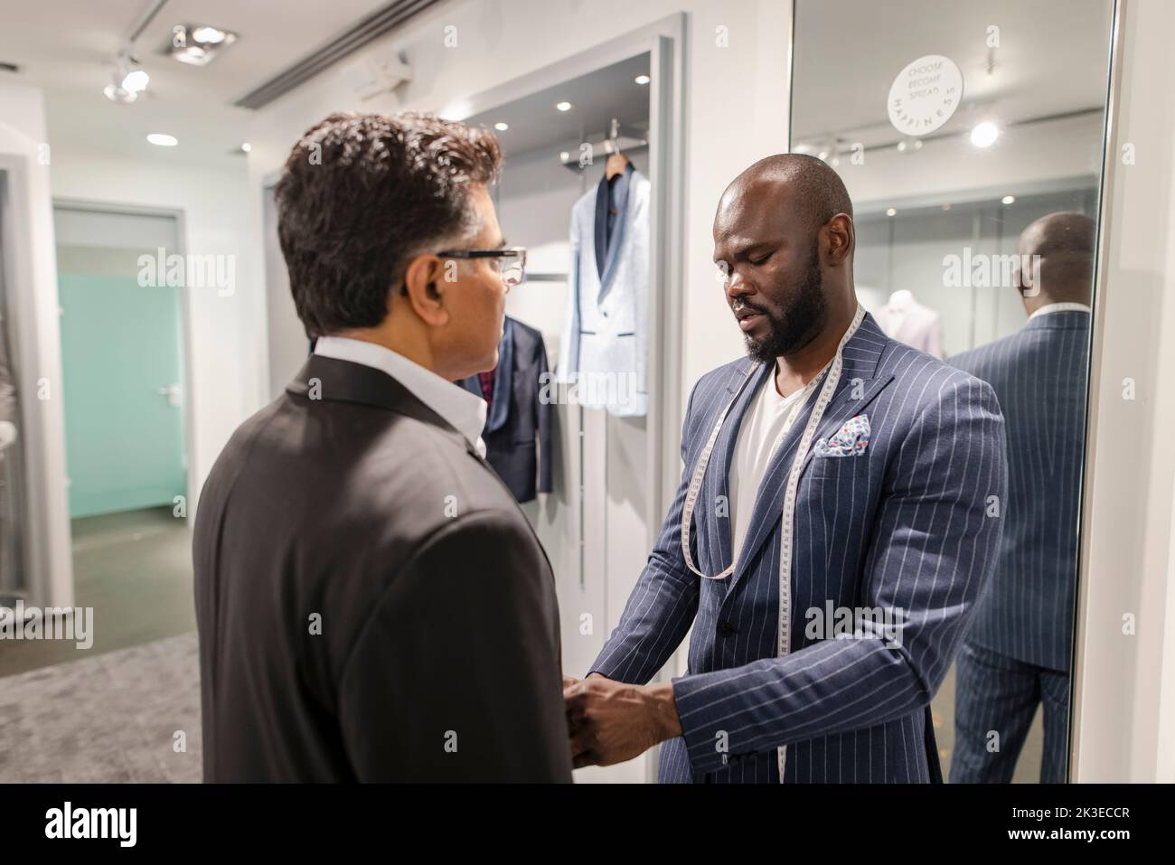 Suit fitting tailor hi-res stock photography and images - Alamy