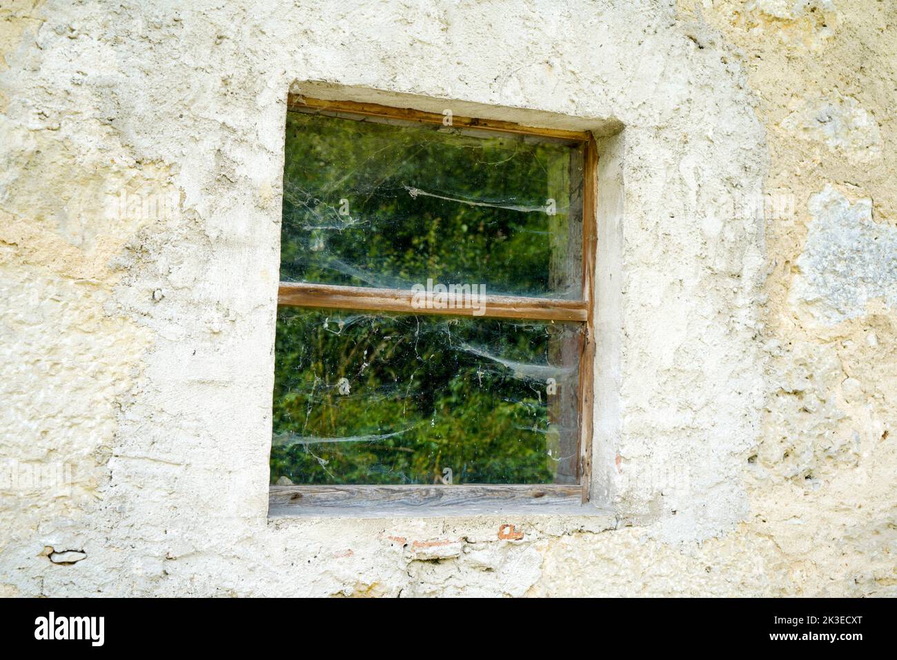 Broken, smashed window glass on an uninhabited building in Bavaria ...